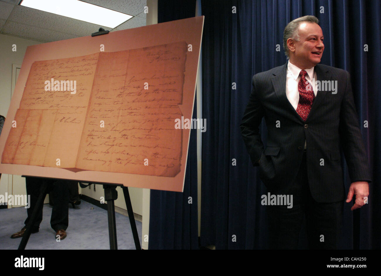 Joseph Romito stands beside a photograph of the Calhoun Letter as ...