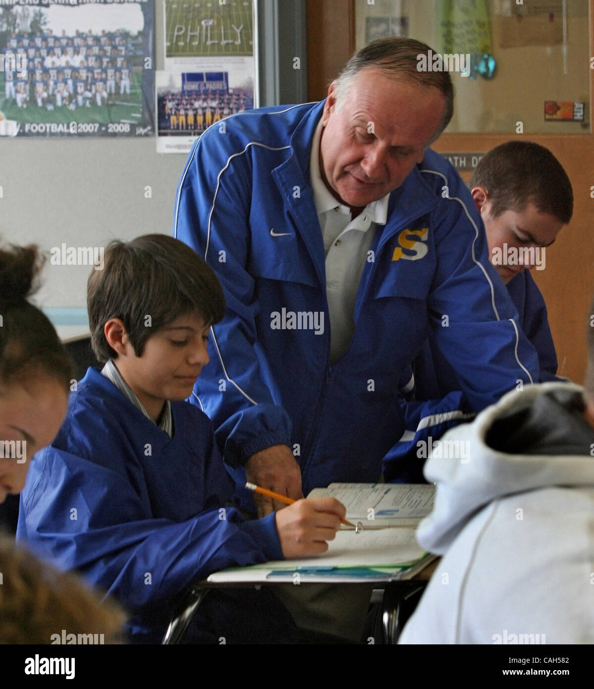 Teacher Randy Vogel helps Alex Cervantes in an algebra class, at Serra ...