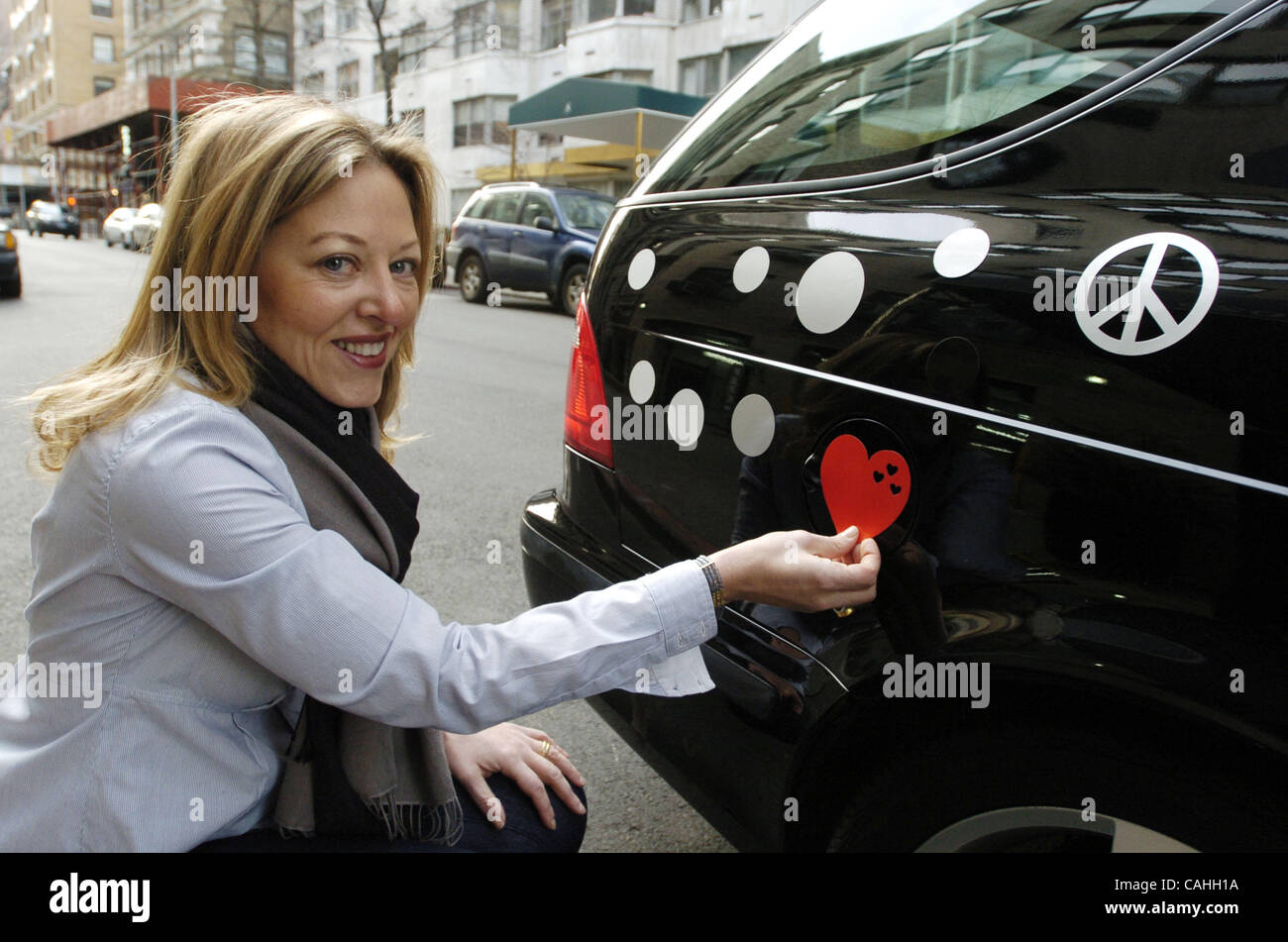 Wendy Slavin applying Sticars to her car. Wendy Slavin and Erica ...
