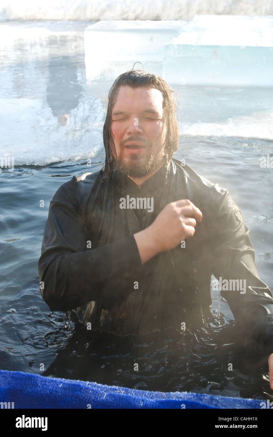 A prist while Epiphany Bathing. Russian people believe that cold ...