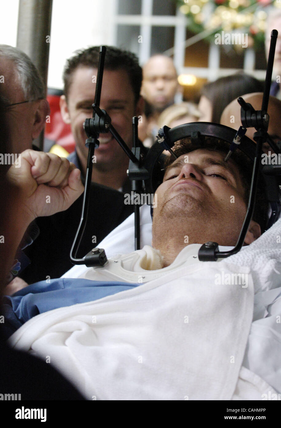 Firefighter Brian Smith, 43, of Ladder Company 44, pumps his fist as he ...
