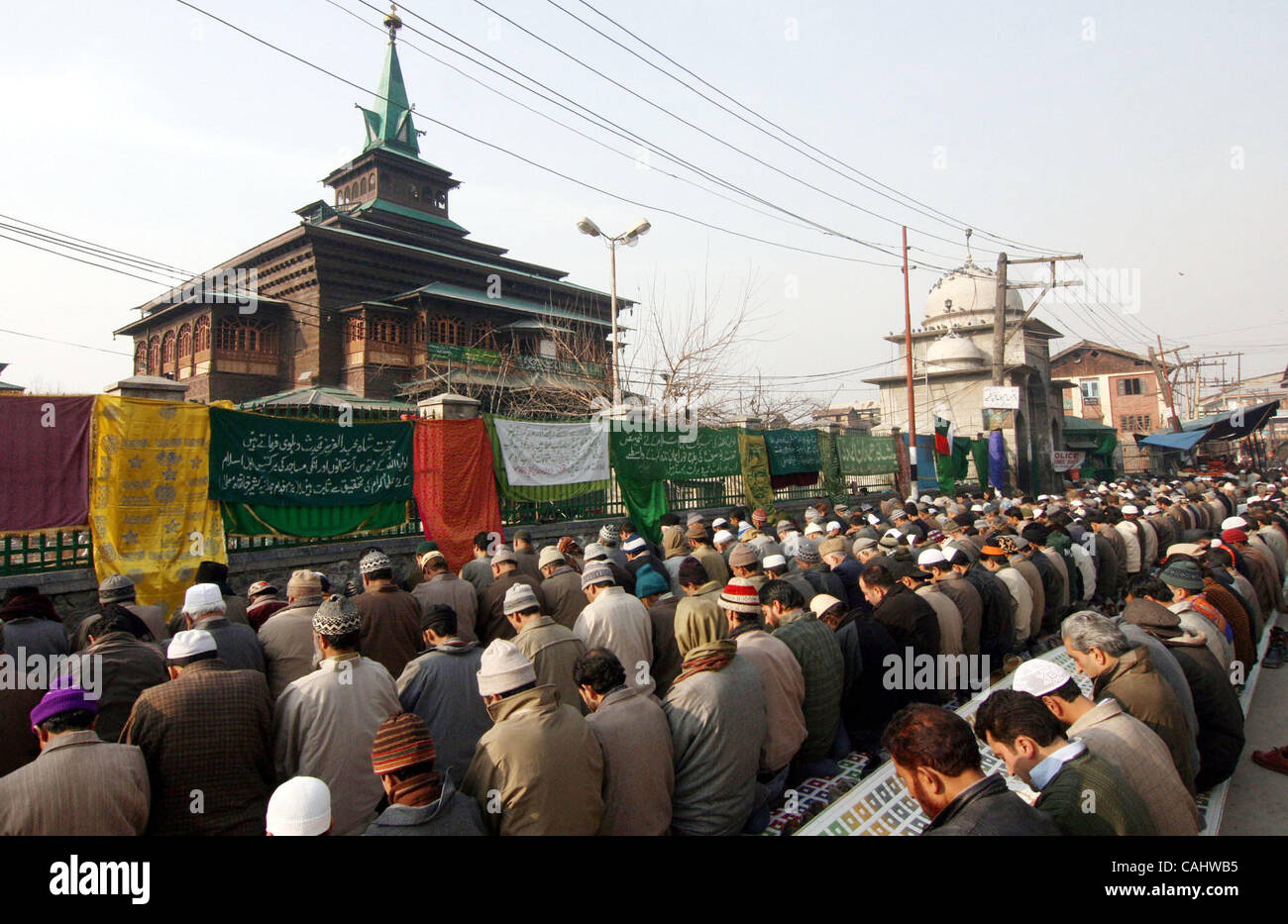 Kashmiri Muslims perform prayers at the shrine of Mir Syed Ali Hamdani ...