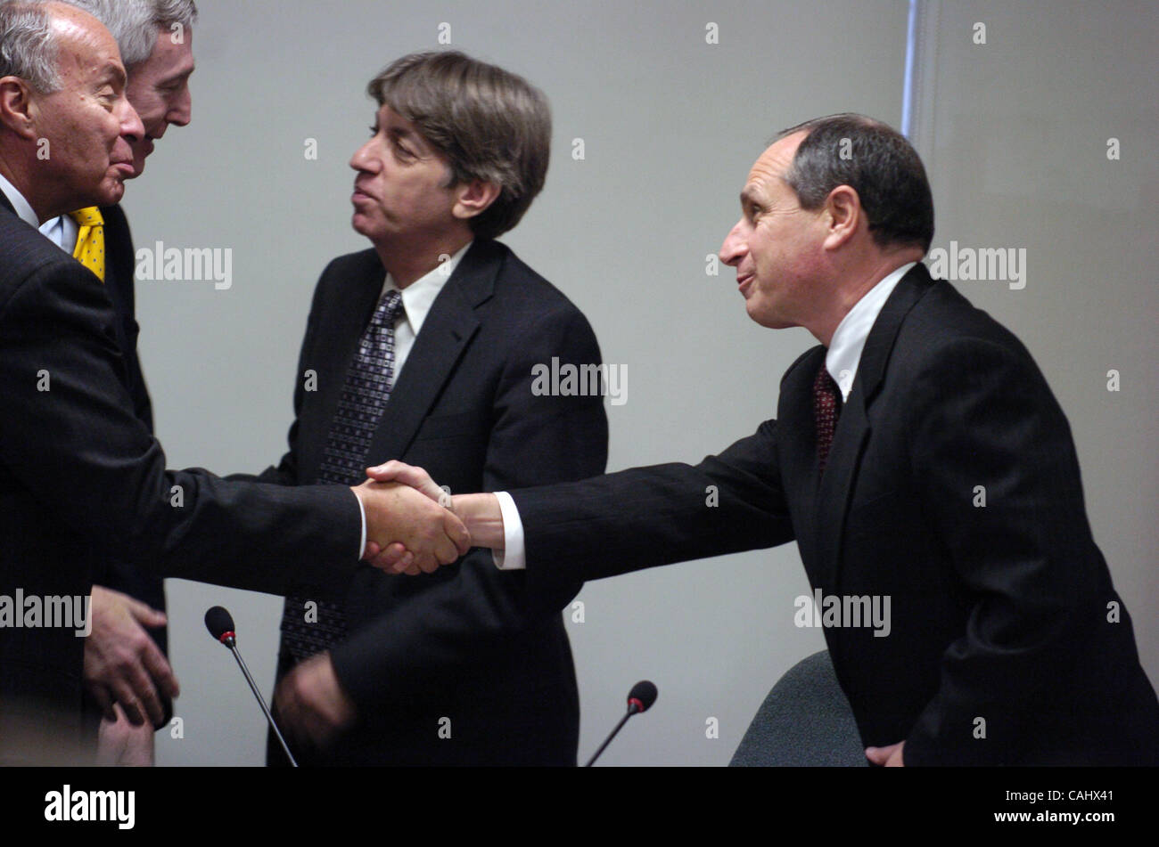 Chief Executive Officer and CEO - MTA Elliot G. Sander (R) shakes hands ...