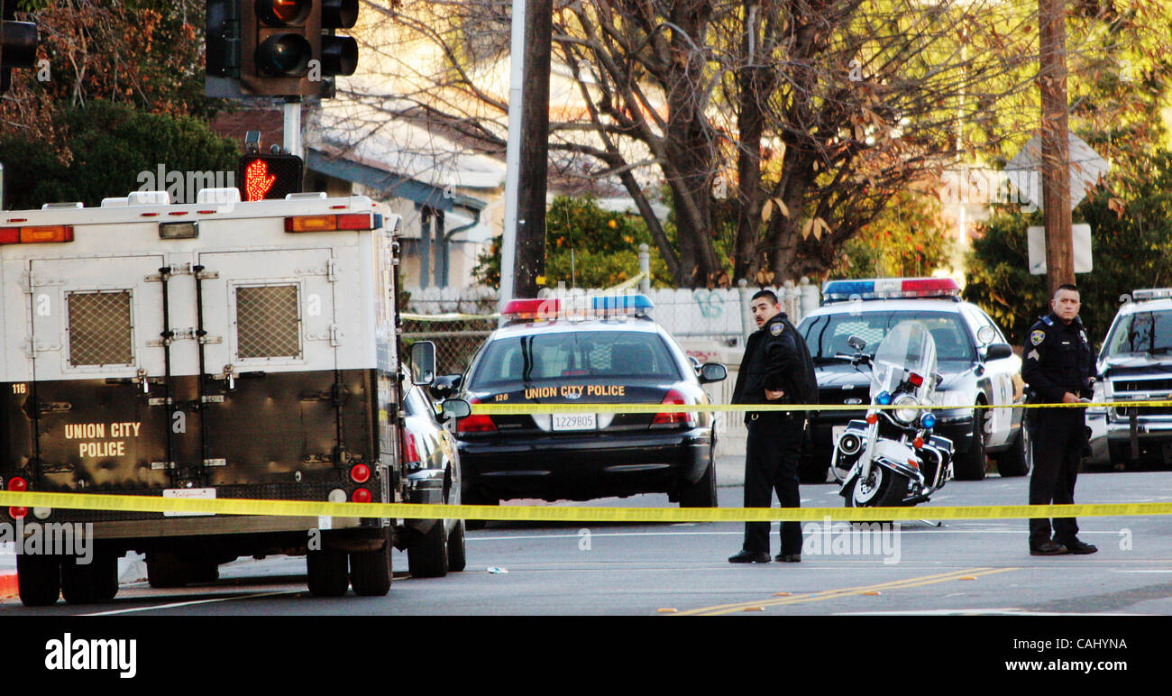 Union City Police Officers block off a portion of Whipple Road in front ...