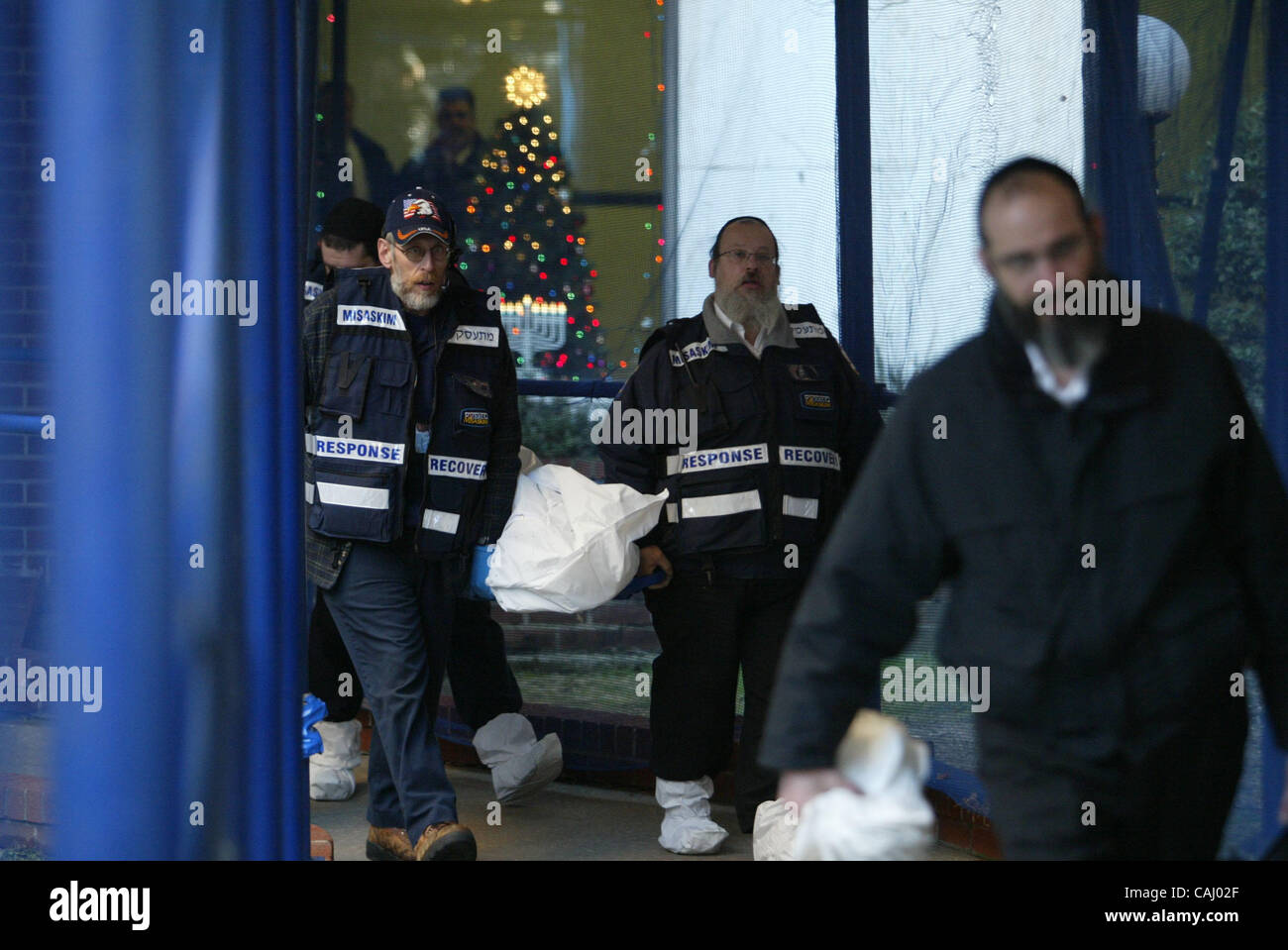EMS taking the body of a smoke inhalation victim of Harvey Kurdish ...