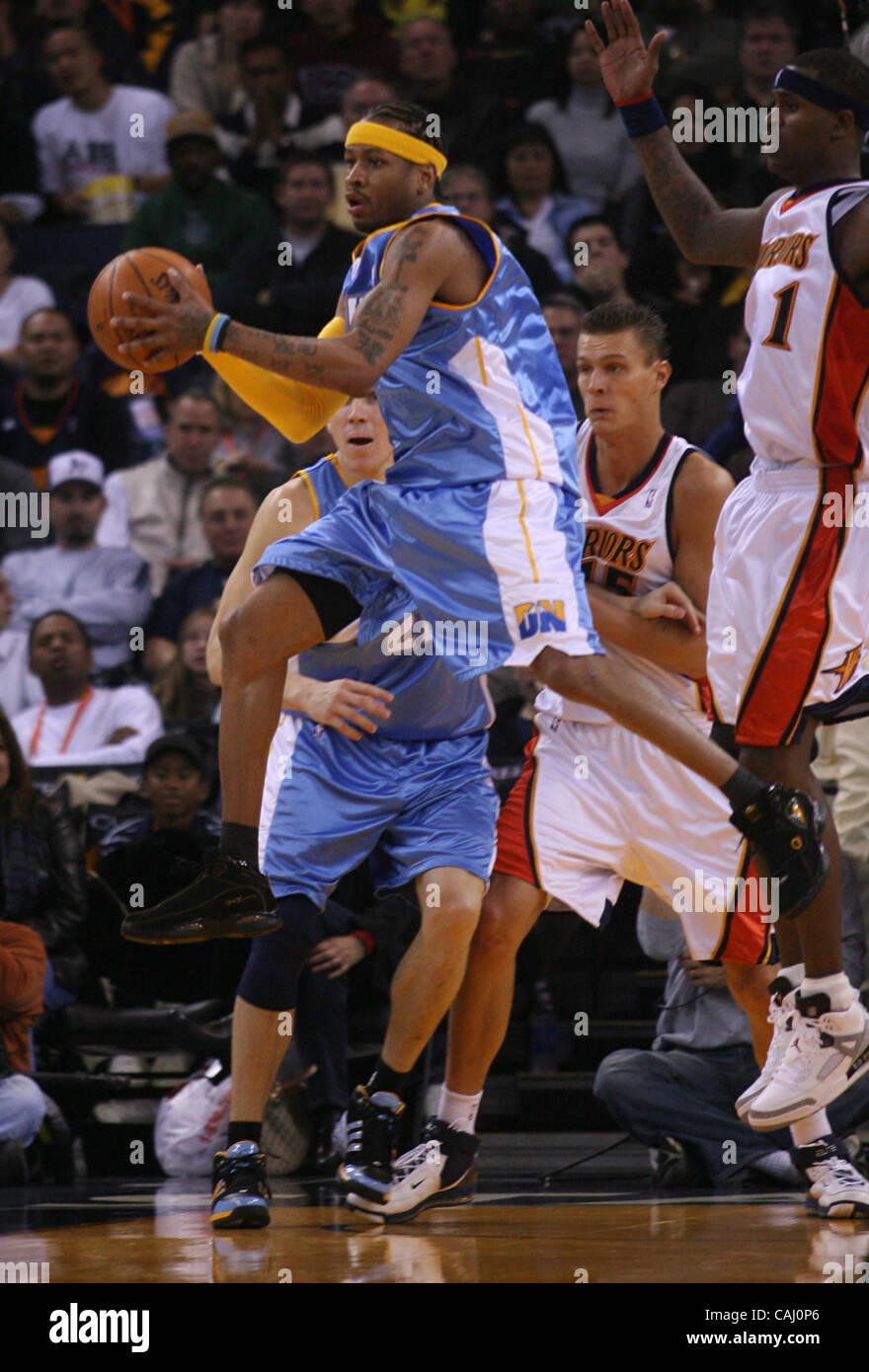 Nuggets #3 Allen Iverson looks for a pass during Friday night's game ...