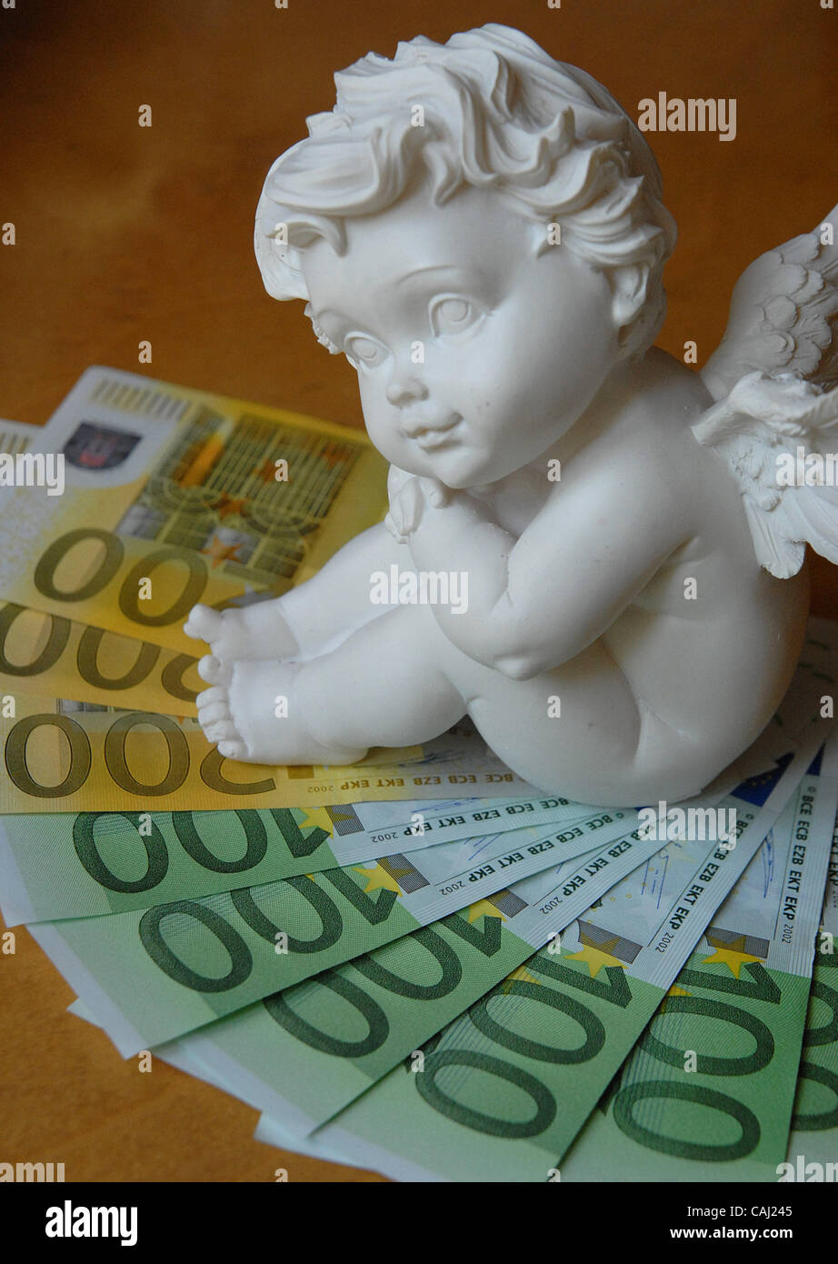 Angel and Euro Stock Photo - Alamy