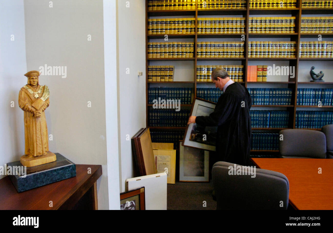 JUMP LEDE -- The Honorable James Mize unpacks his new officce as the ...