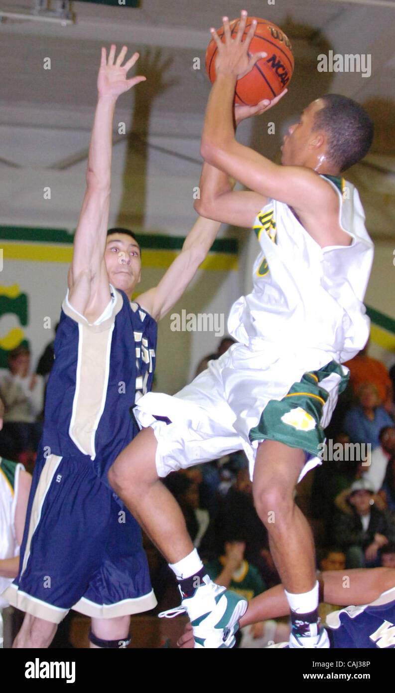 Tracy High basketball player Khrystopher Lawson takes a shot as West ...
