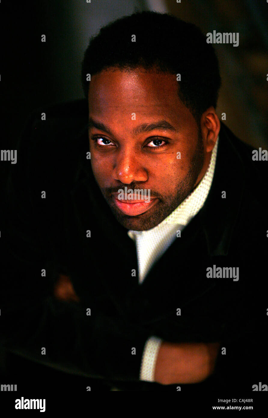 Novelist-playright and director David E. Talbert, poses at his home in ...