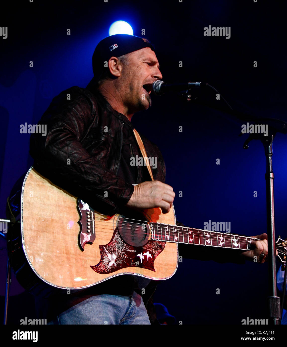 Actor Kevin Costner with his band Modern West at the Gibson Guitar tent ...