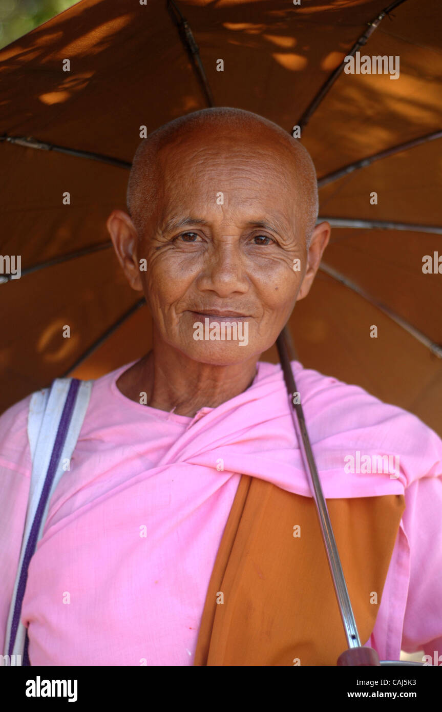Jan 08, 2008 - Rangood, Burma, Myanmar - A female Burmese monk poses ...