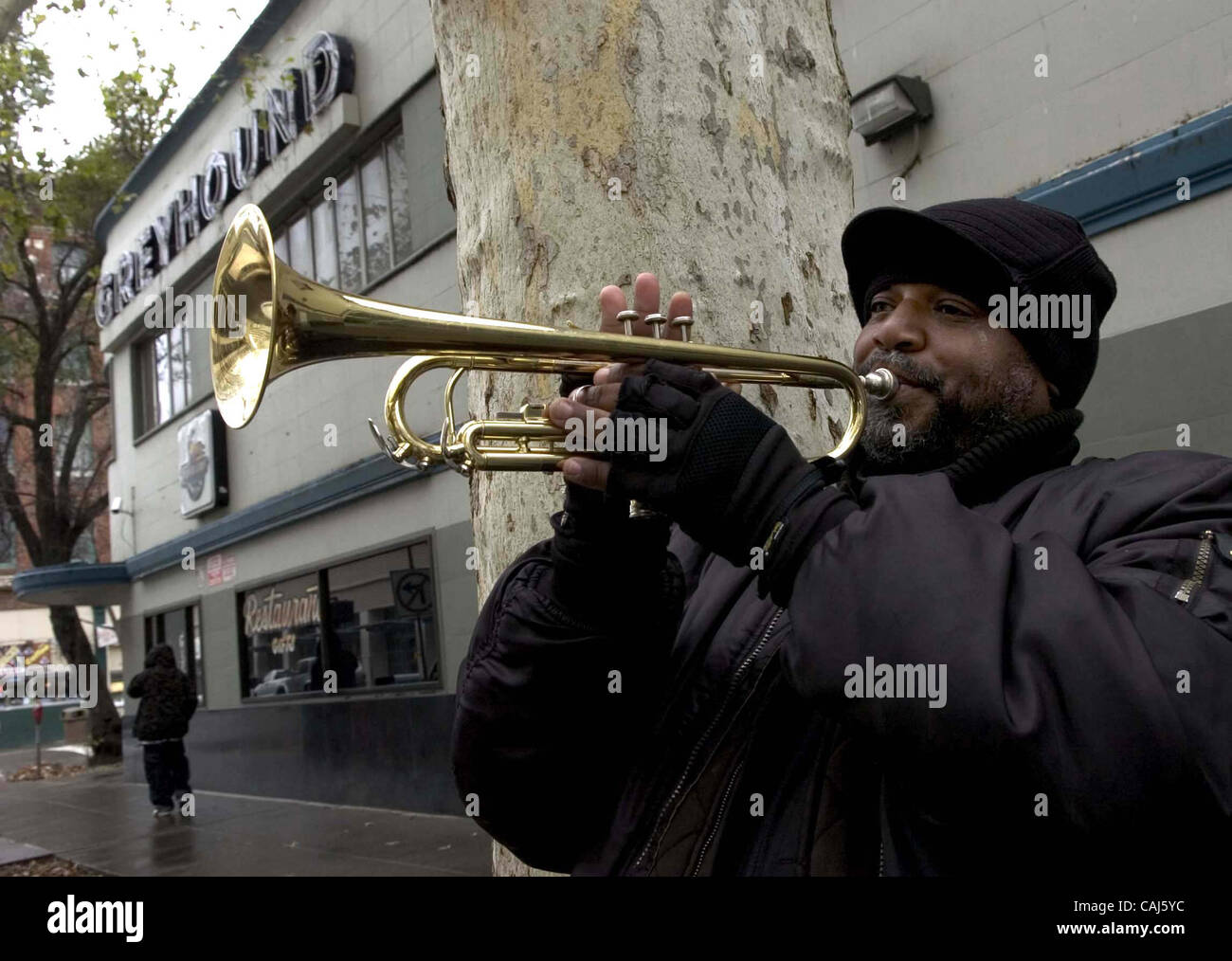 Kenneth Young a traveling street musician from Reno was playing a song ...