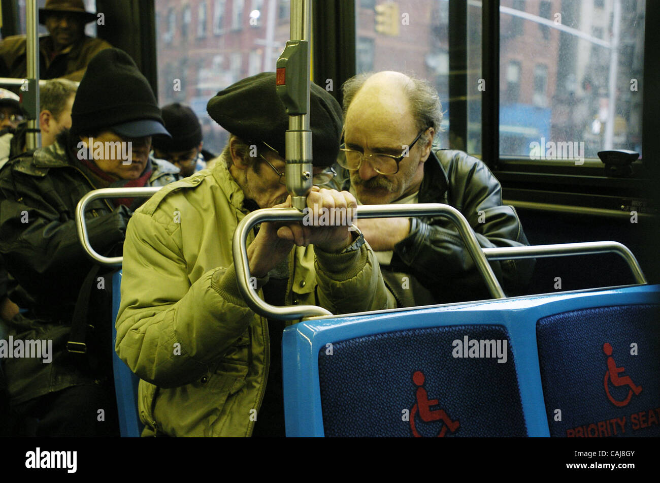 James O'Hare (L) and David Dalaia (R) on the M11 bus downtown. James O ...