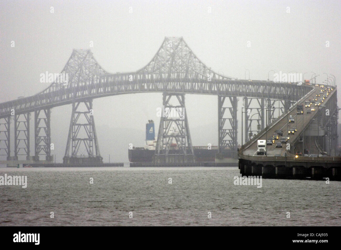 A large ship makes its way under the Richmond/San Rafael Bridge in San ...