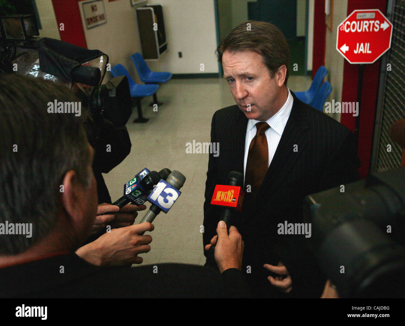 Tom Johnson, attorney for Kristina Fuelling talks to members of the ...