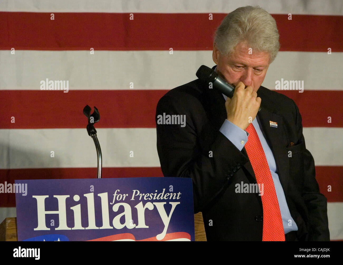 Former U.S. President Bill Clinton listens to a question while ...