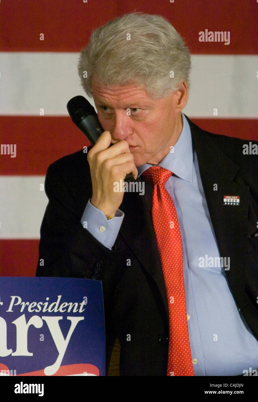 Former U.S. President Bill Clinton listens to a question while ...