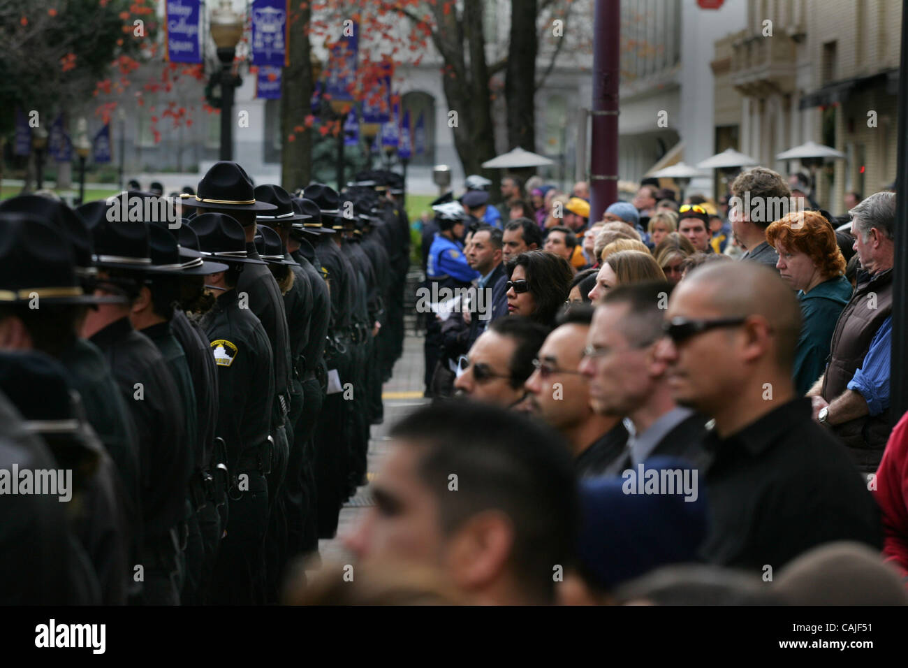 The casket for fallen police detective Vu D. Nguyen makes it way from ...