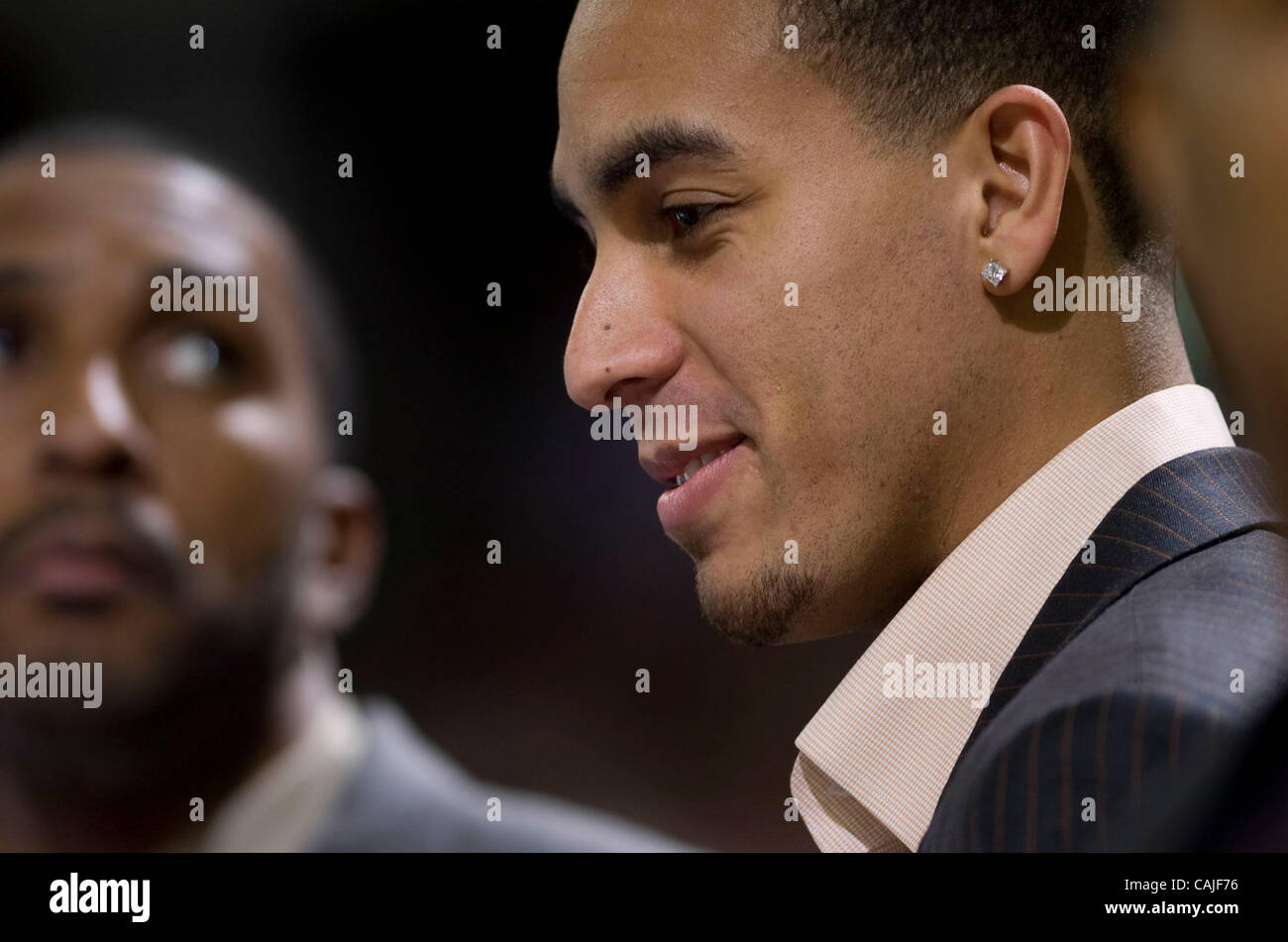 Sidelined Sacramento King Kevin Martin on the bench as his team takes ...