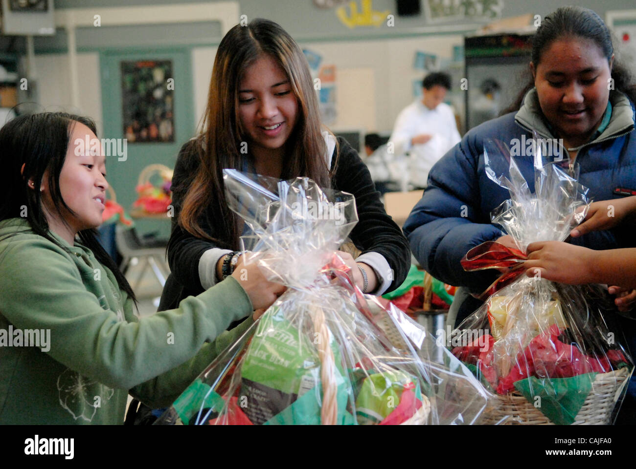 From left, Ker Cha (cq), 21, Edlin Garcia (cq), 16, and Laura Tolo (cq ...