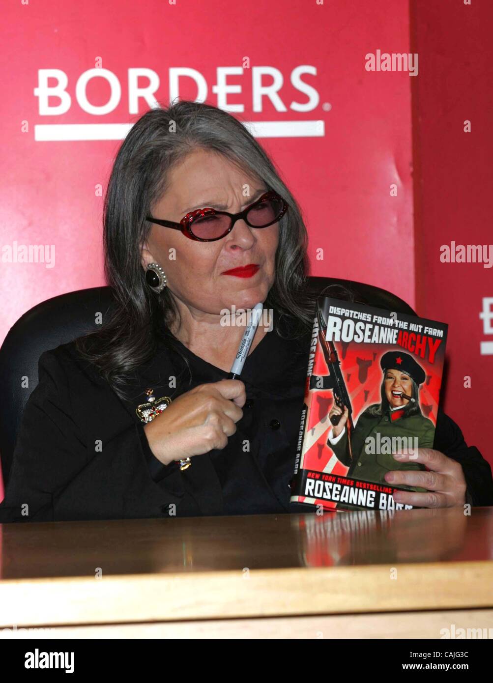 Jan. 6, 2011 - New York, New York, U.S. - ROSEANNE BARR signs copies of ...