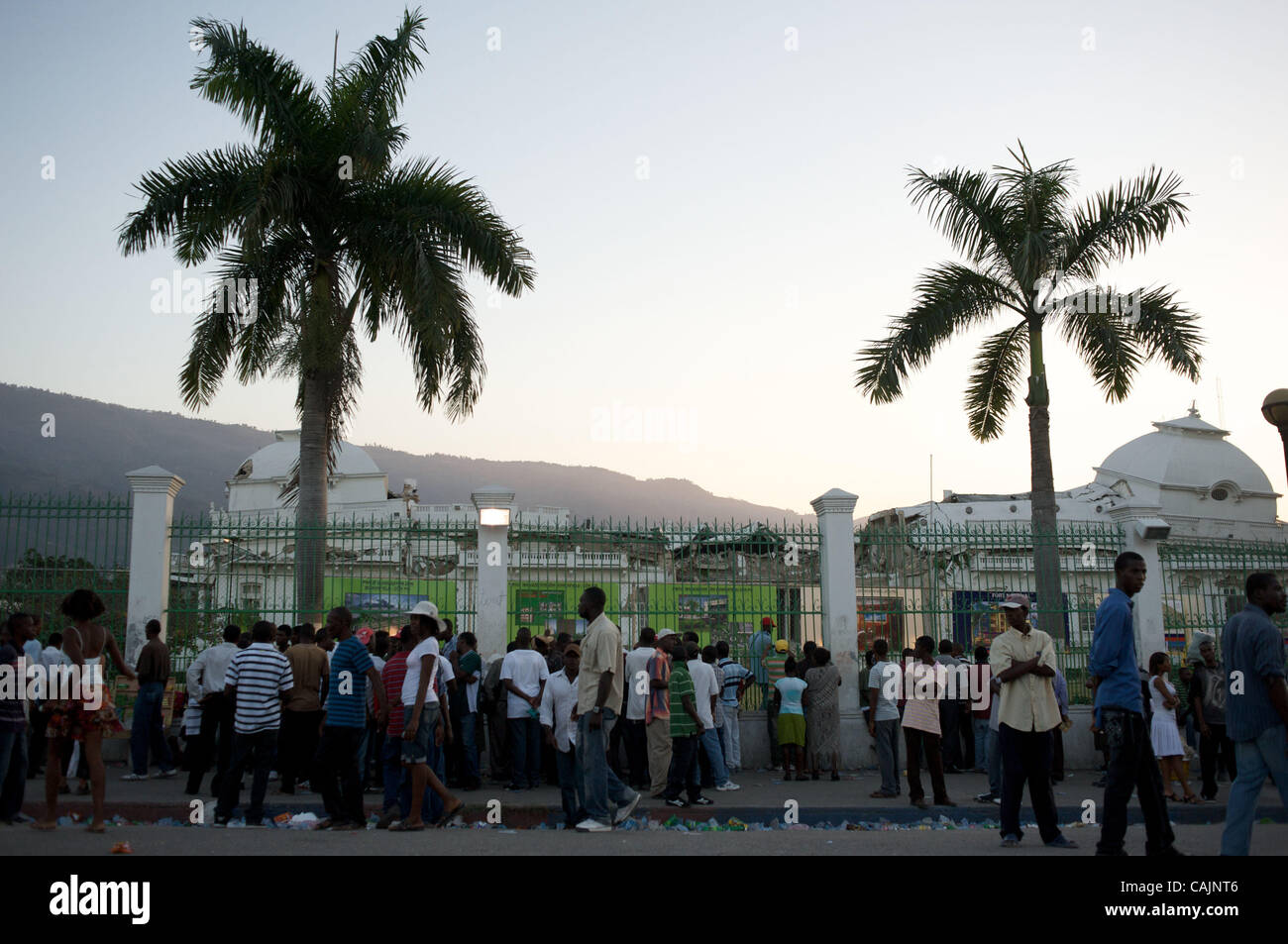 Jan 12, 2011 - Port Au Prince, Haiti - Mourners gather at the collapsed ...