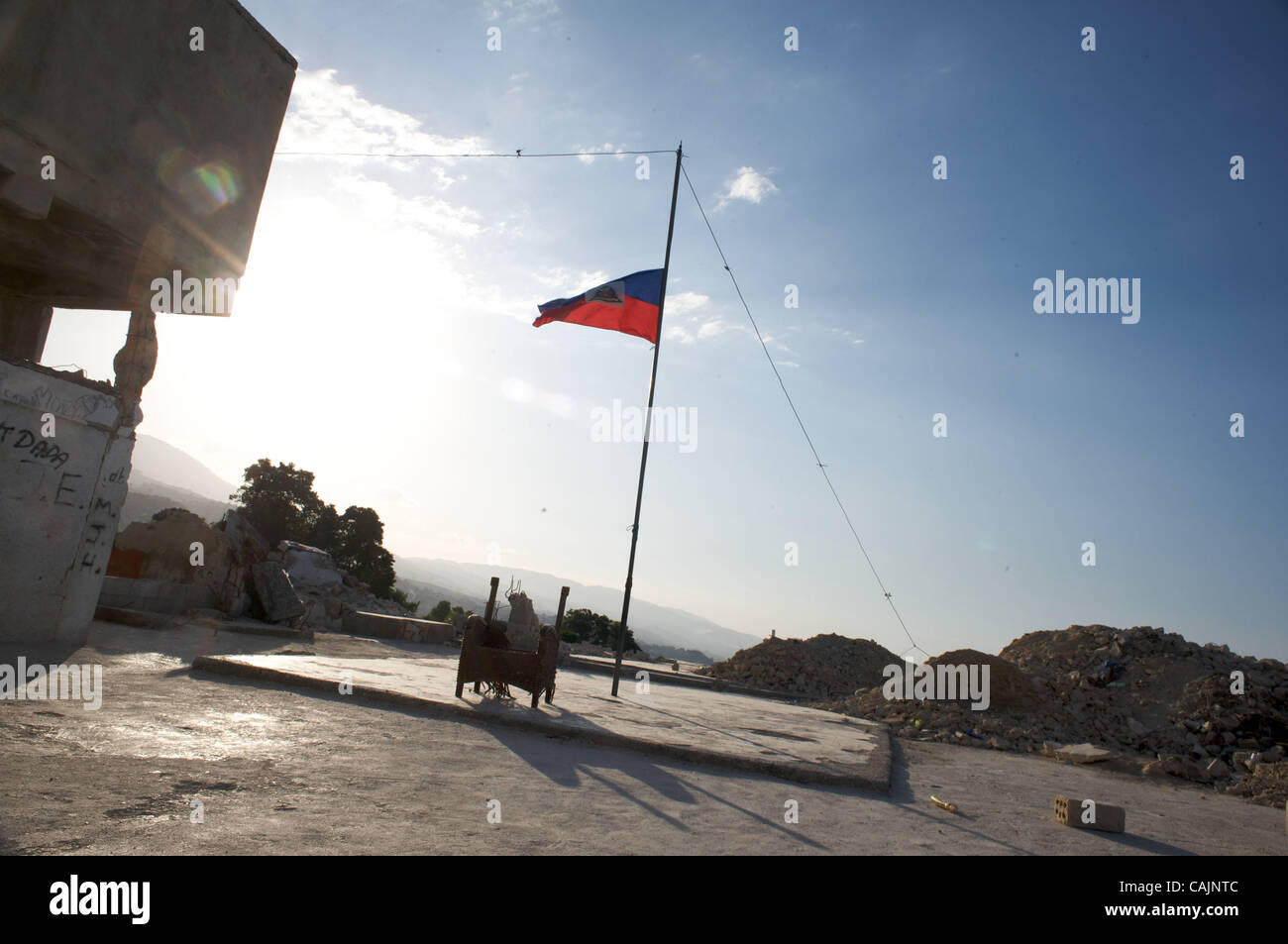 Jan 12, 2011 - Port Au Prince, Haiti - The Haitian flag flies at half ...