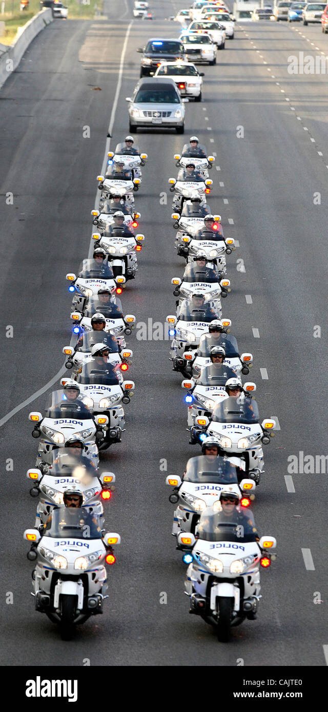 METRO Police motorcyclists lead the funeral procession Thursday morning ...