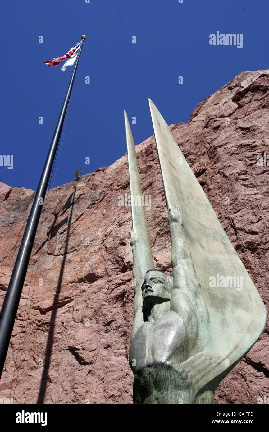 Hoover Dam, also known as Boulder Dam, is a concrete gravity-arch dam ...