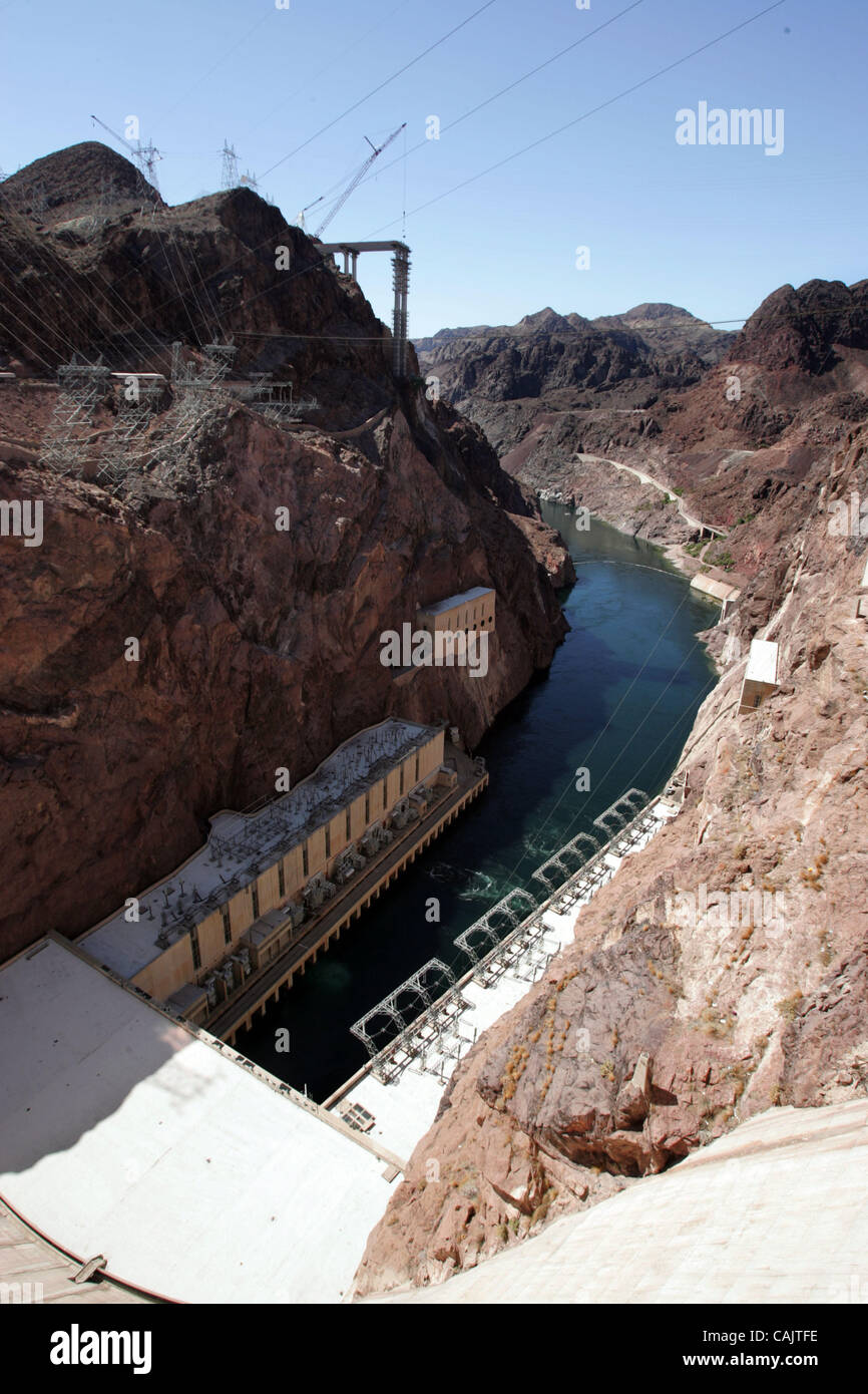 Hoover Dam, also known as Boulder Dam, is a concrete gravity-arch dam ...
