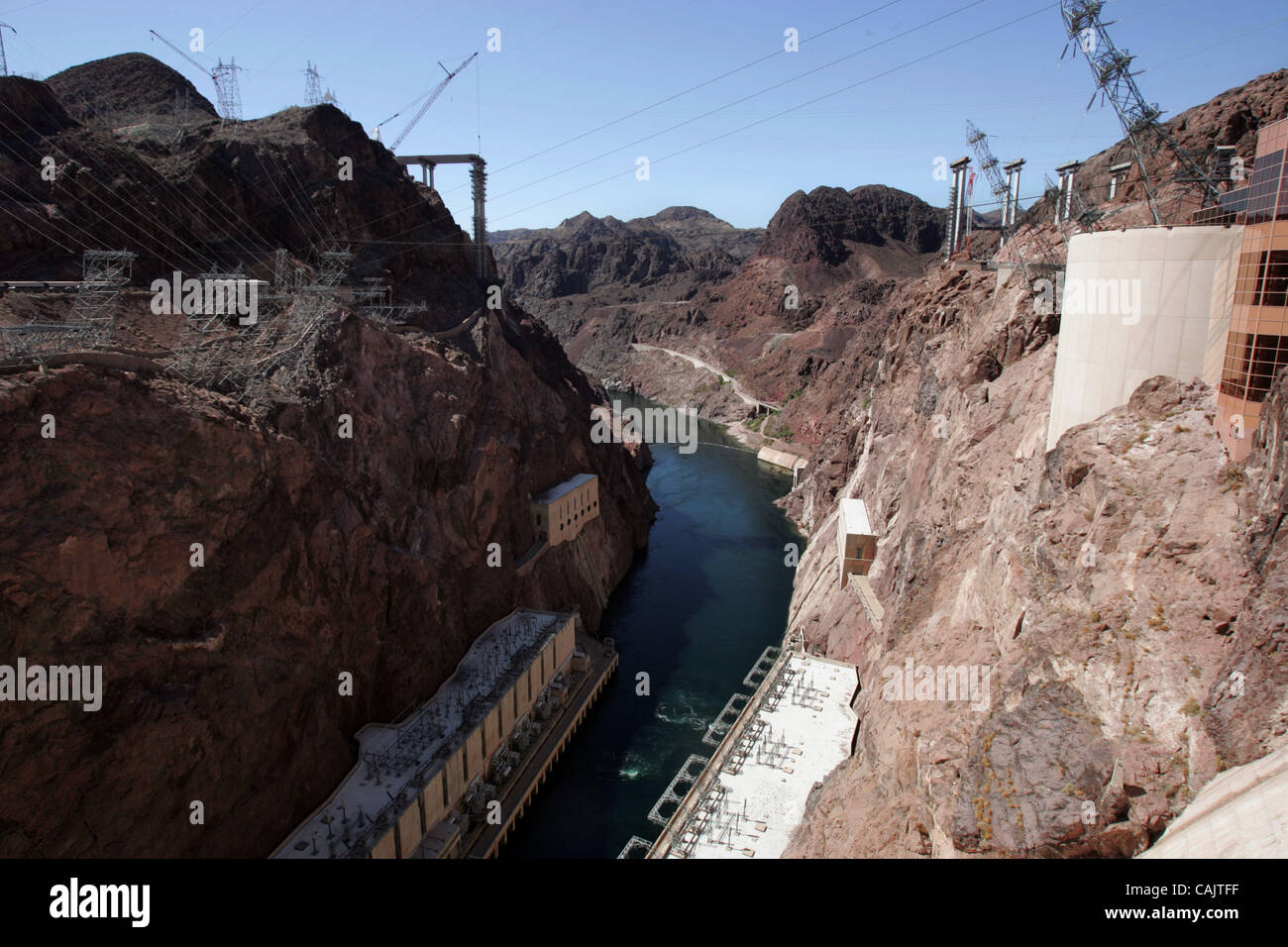 Hoover Dam, also known as Boulder Dam, is a concrete gravity-arch dam ...