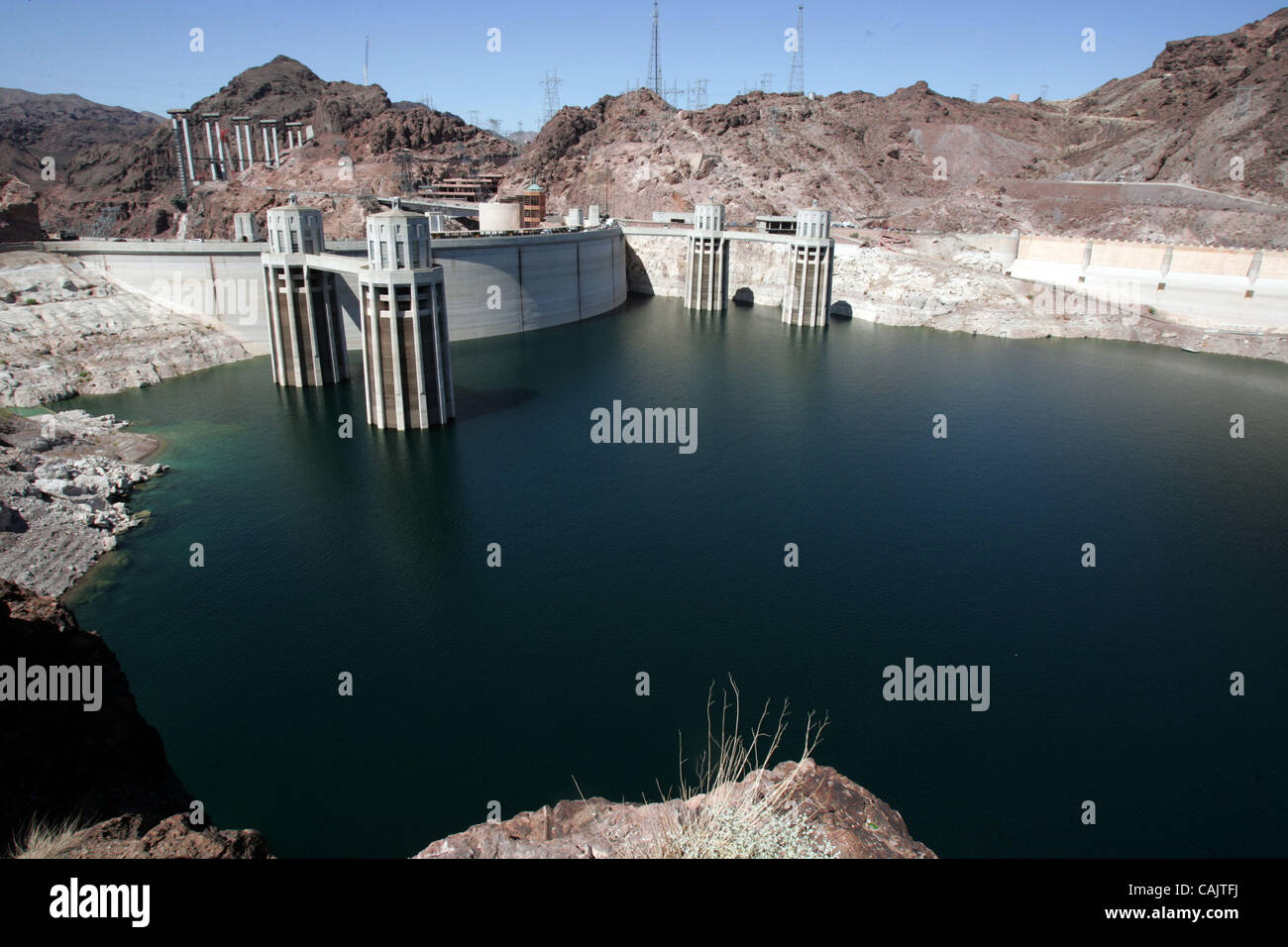 Hoover Dam, also known as Boulder Dam, is a concrete gravity-arch dam ...