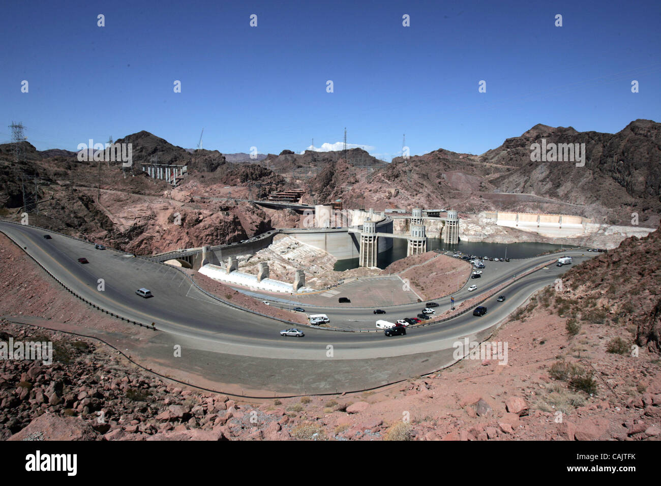 Hoover Dam, also known as Boulder Dam, is a concrete gravity-arch dam ...