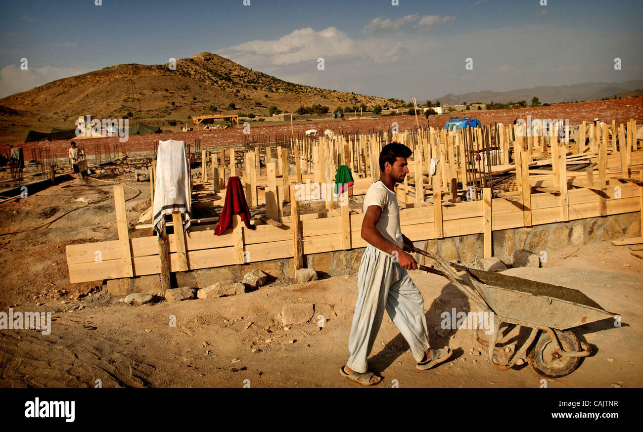 Sep 27, 2007 - Sabari, Afghanistan - An Afghan worker rolls a ...