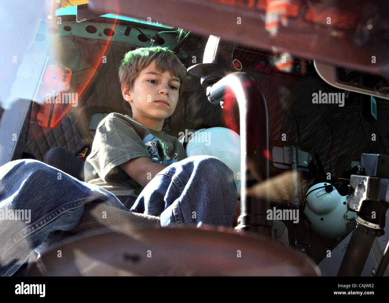 Zack Israelit,8,from Burlingame,sits in the cockpit of a CDF helicopter ...