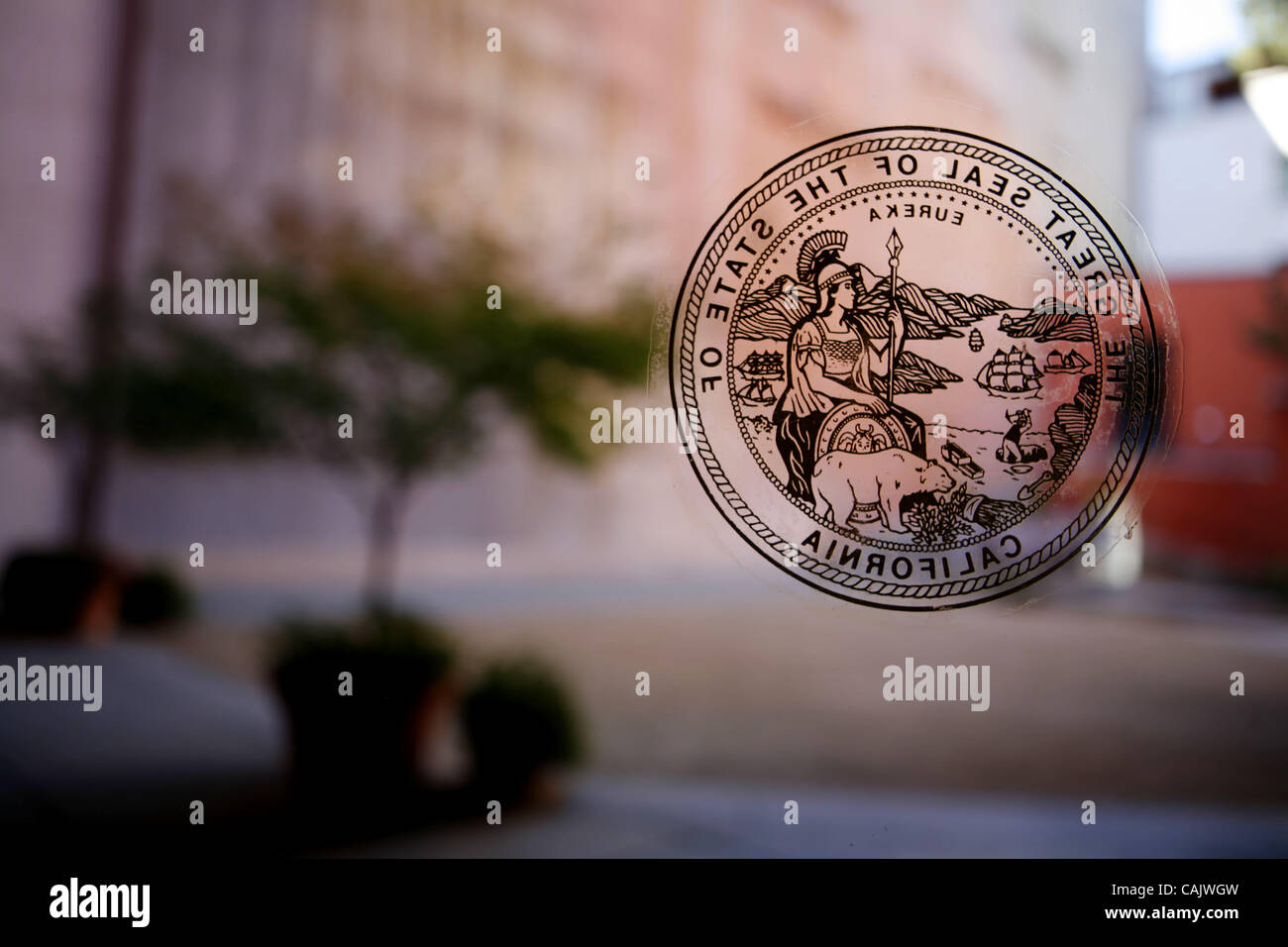 The Secretary of State's logo sits on the window of the door that faces ...