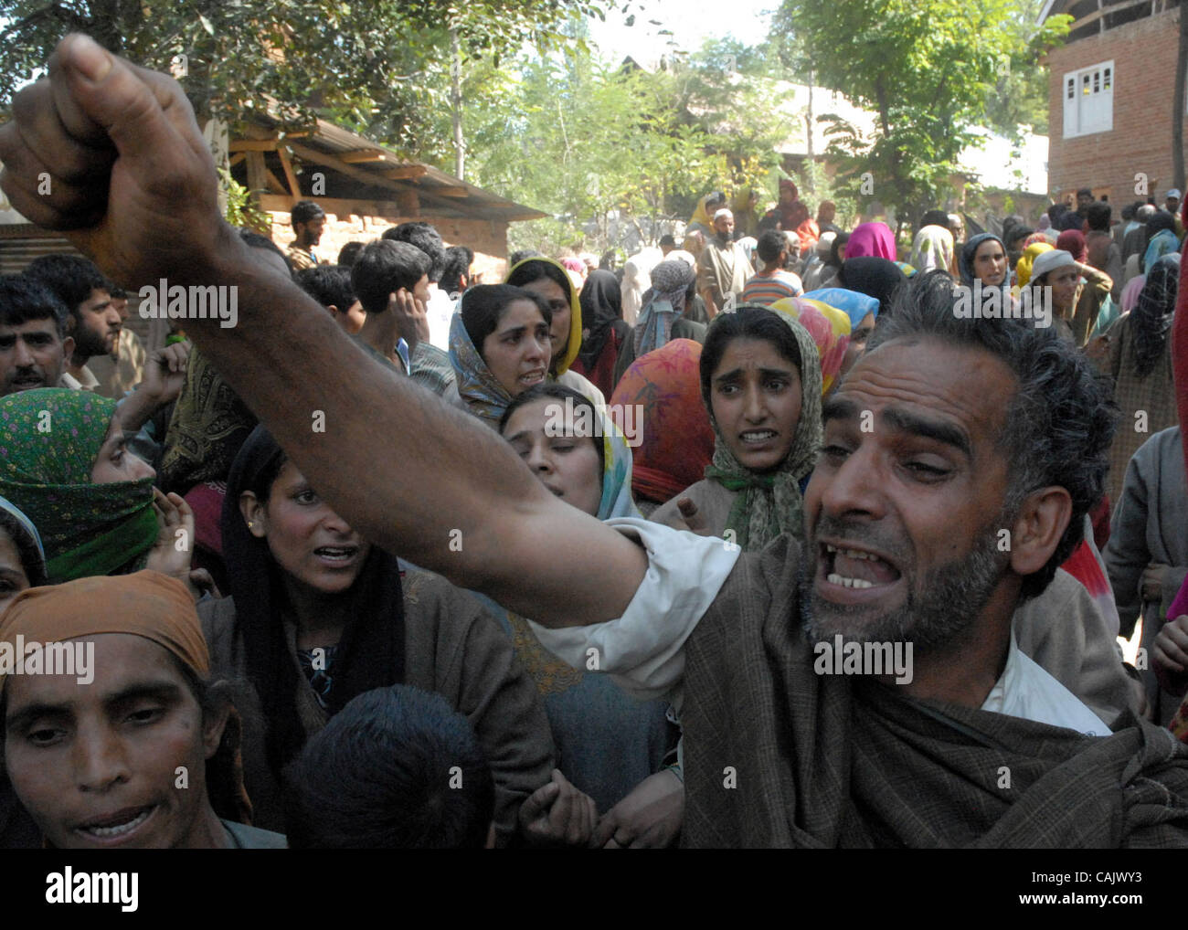 Kashmiri Muslim men protest outside a mosque after a gunbattle between ...