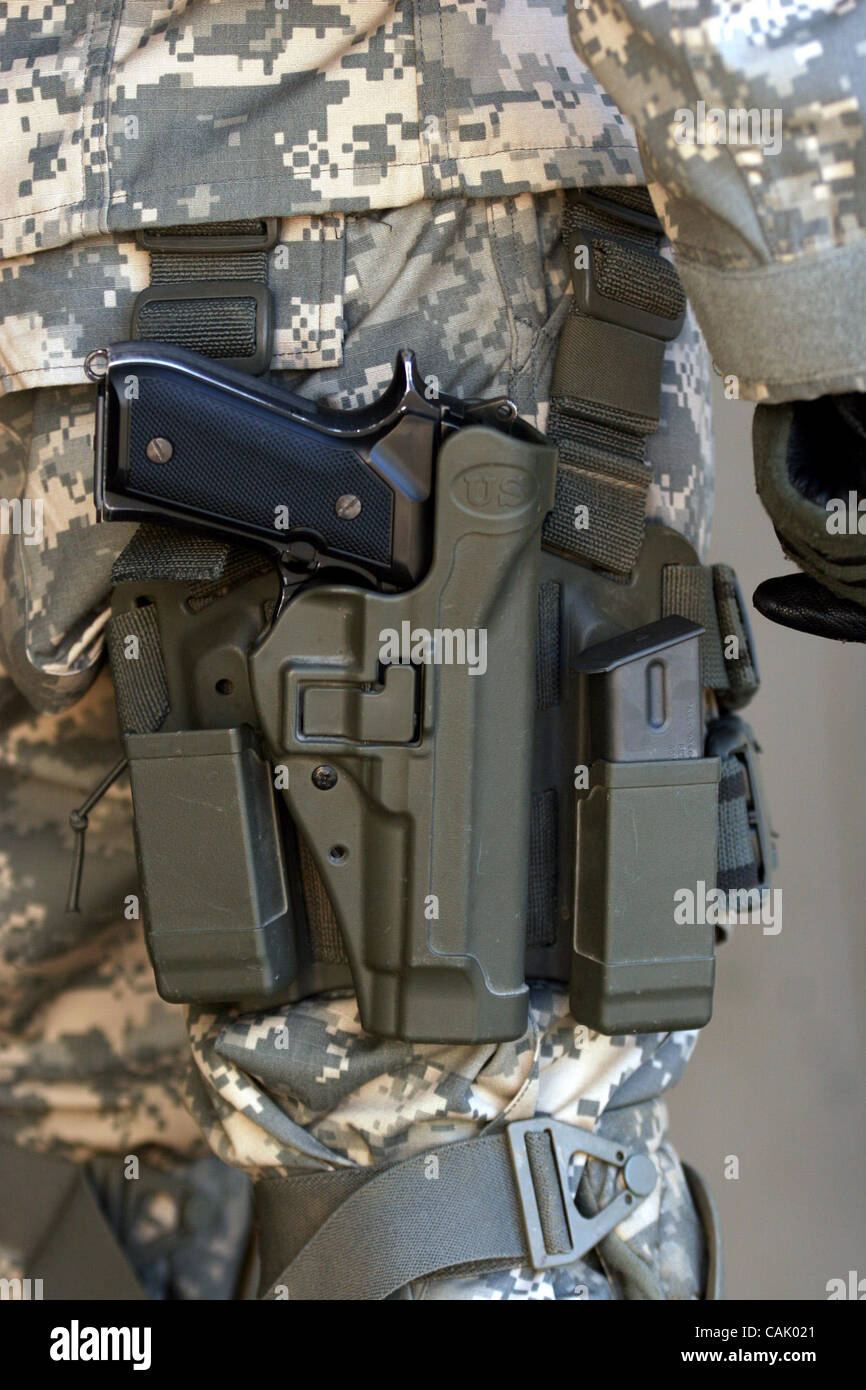 Secure holster worn by U.S. Army National Guard Cpl. Andrew Couch at ...