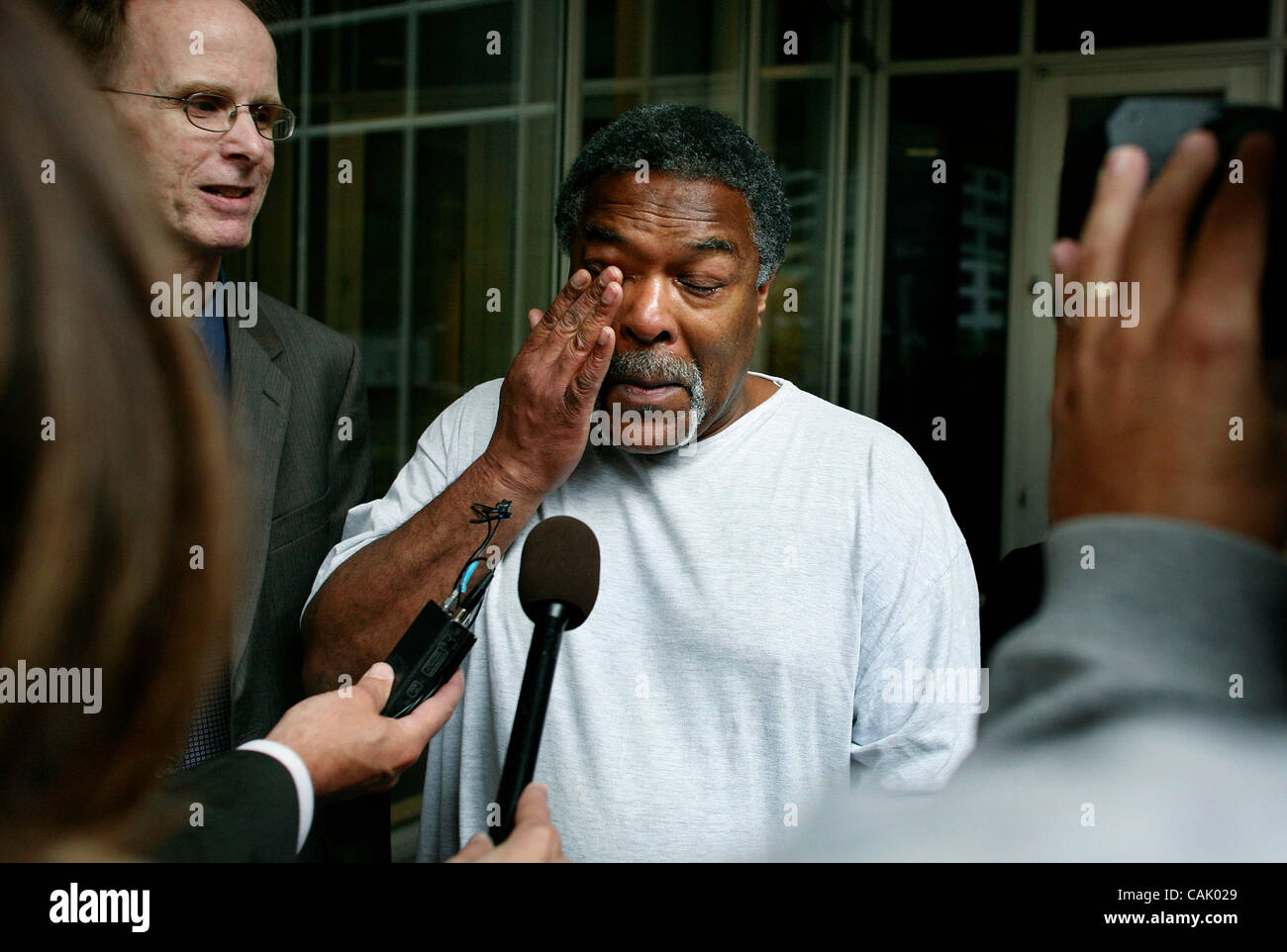 Sherman Townsend, center, talked with reporters after his release from ...