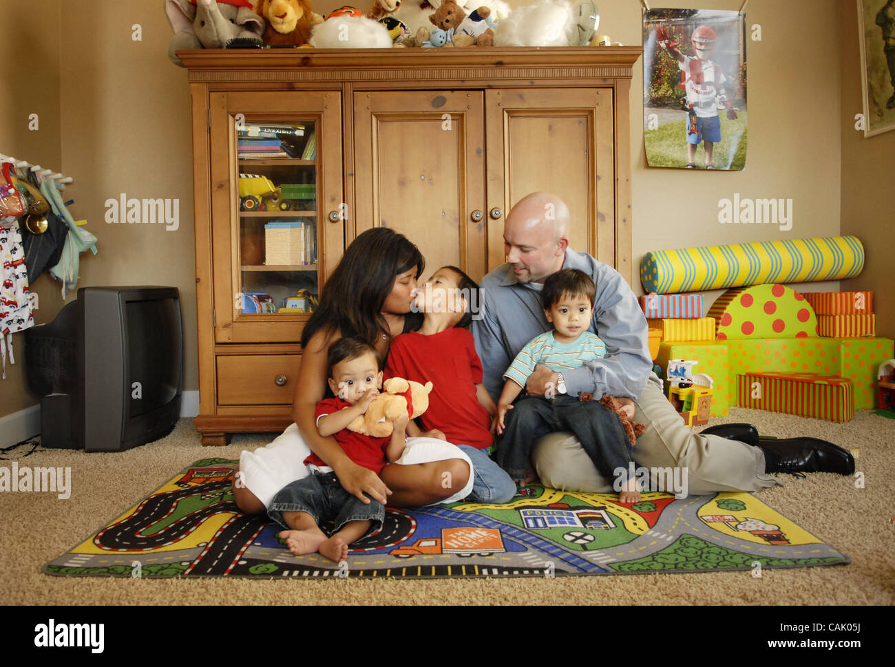 SECOND - Elanie and Tim Purkis's 20 month old twins, Ryan, left, and ...