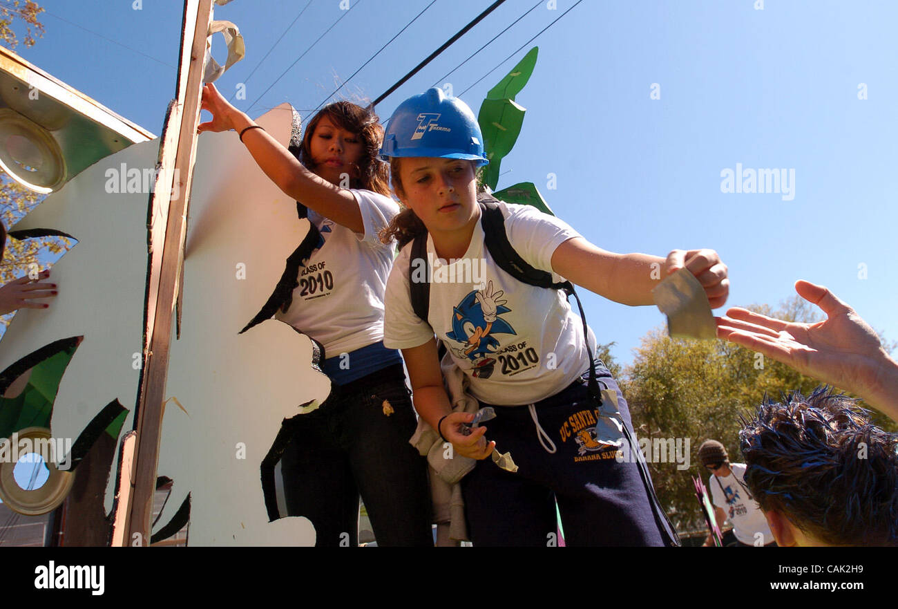 As Lizzie Chen, 15, holds a cutout of Sonic, Alice Cowens, 15, gets ...