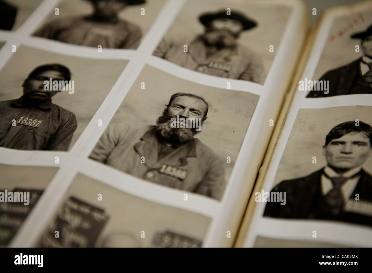 Inmate photos from the Quentin State Prison mug book, sits on display ...