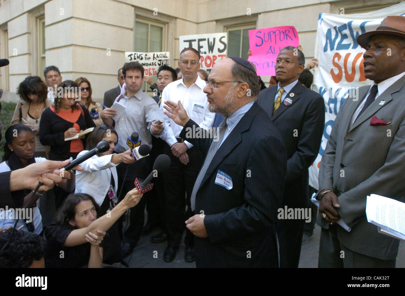 Rabbi Michael Paley speaks as Parents, elected officials and other ...
