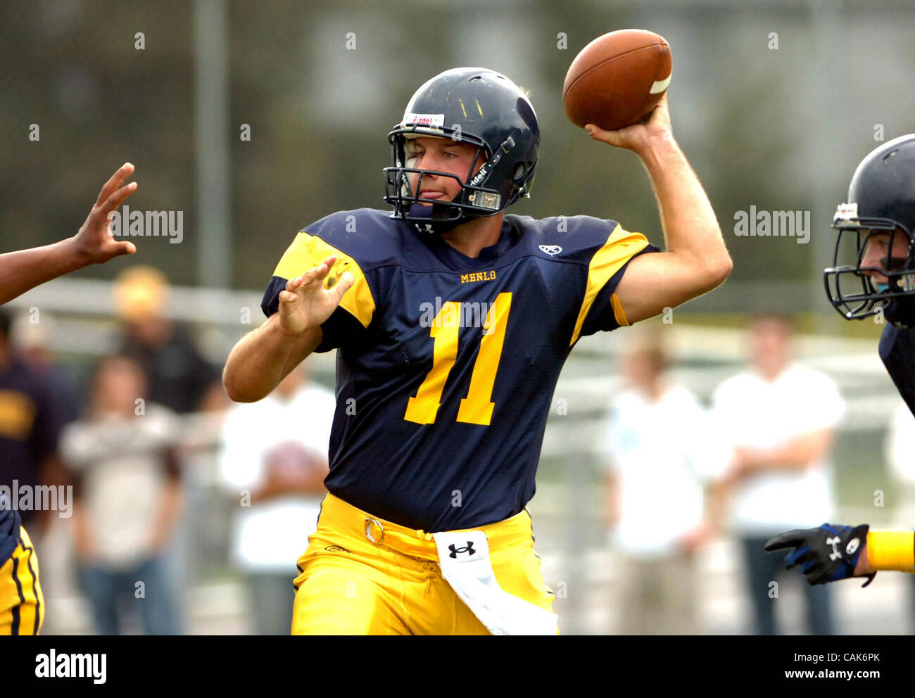 Menlo School quarterback Travis Boyce makes the pass during action against Terra Nova Friday ...