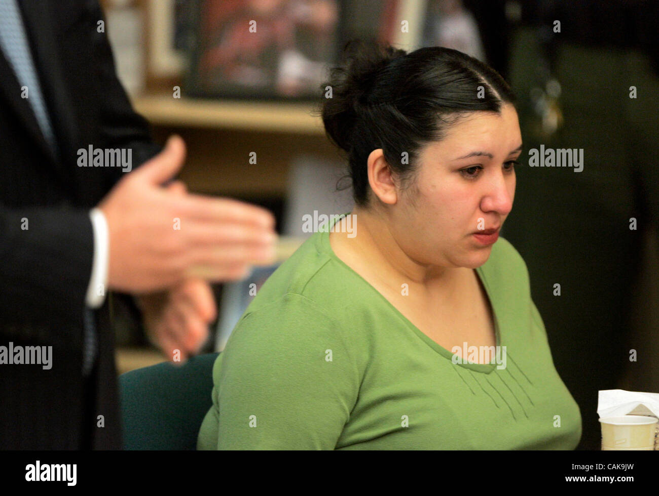 September 26, 2007, Vista, California, USA EDITH LEDESMA listens during ...