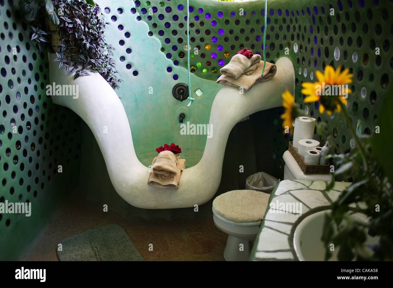 An Earthship, a house made of recycled tires, bottles, and cans in the ...