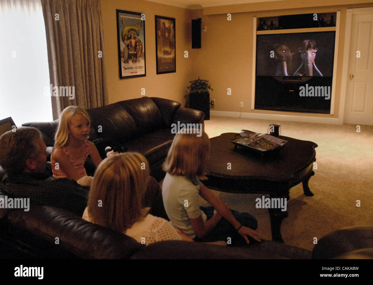From left, Brian Jacobsen (cq) Kelly Jacobsen (cq), 7, Pam Jacobsen (cq ...