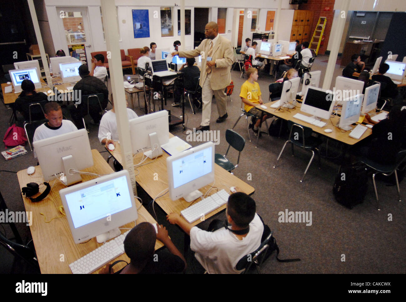 Technology teacher, Jamal Hicks, teaches a Technology Exploration class ...