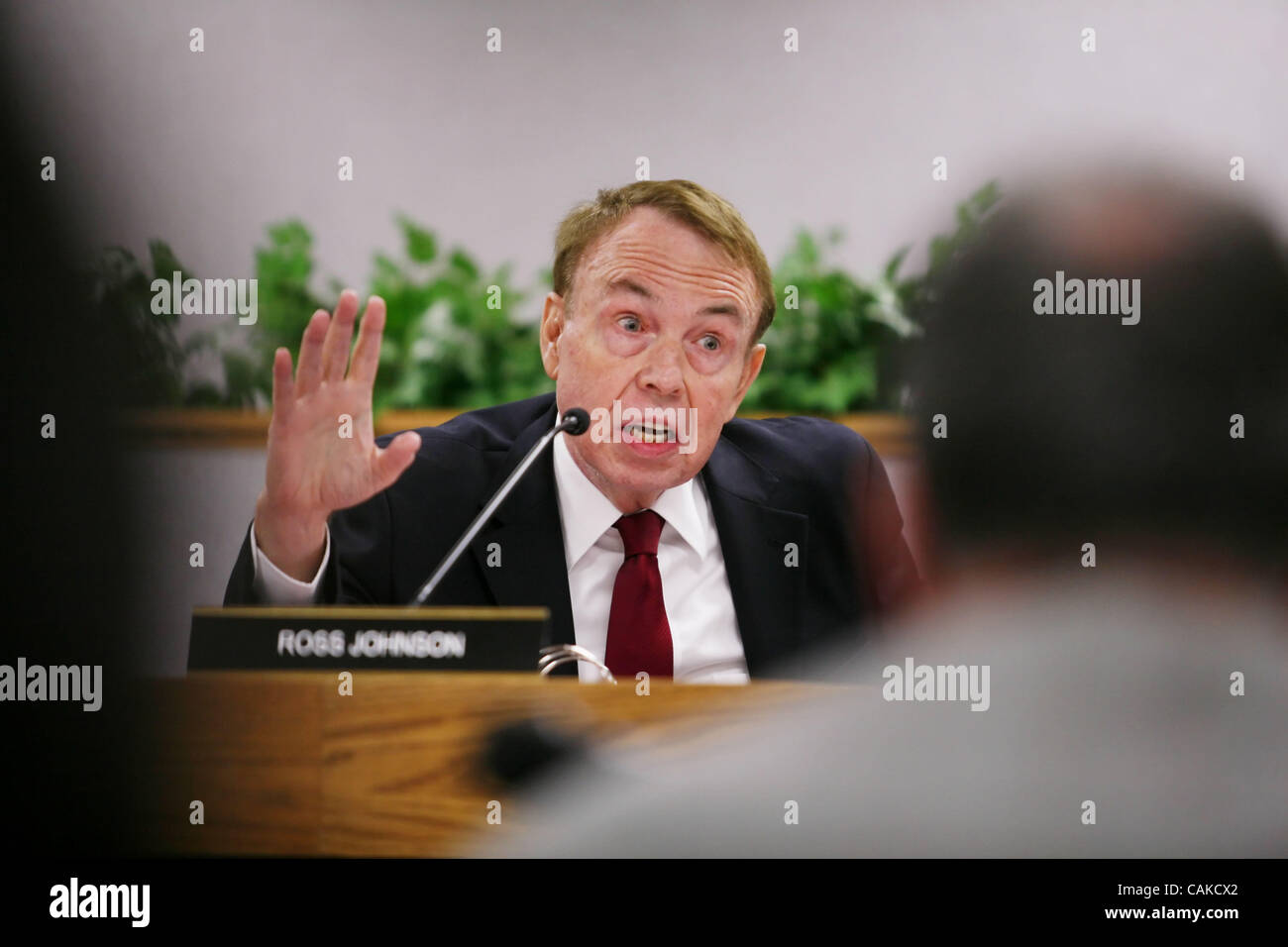 Fair Political Practices Commission Chairman, Ross Johnson, talks as ...